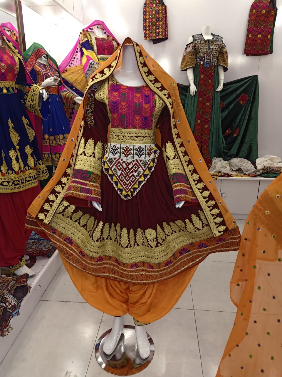 Ladies light golden cherma dozi work done on maroon Phoenix Korean ...